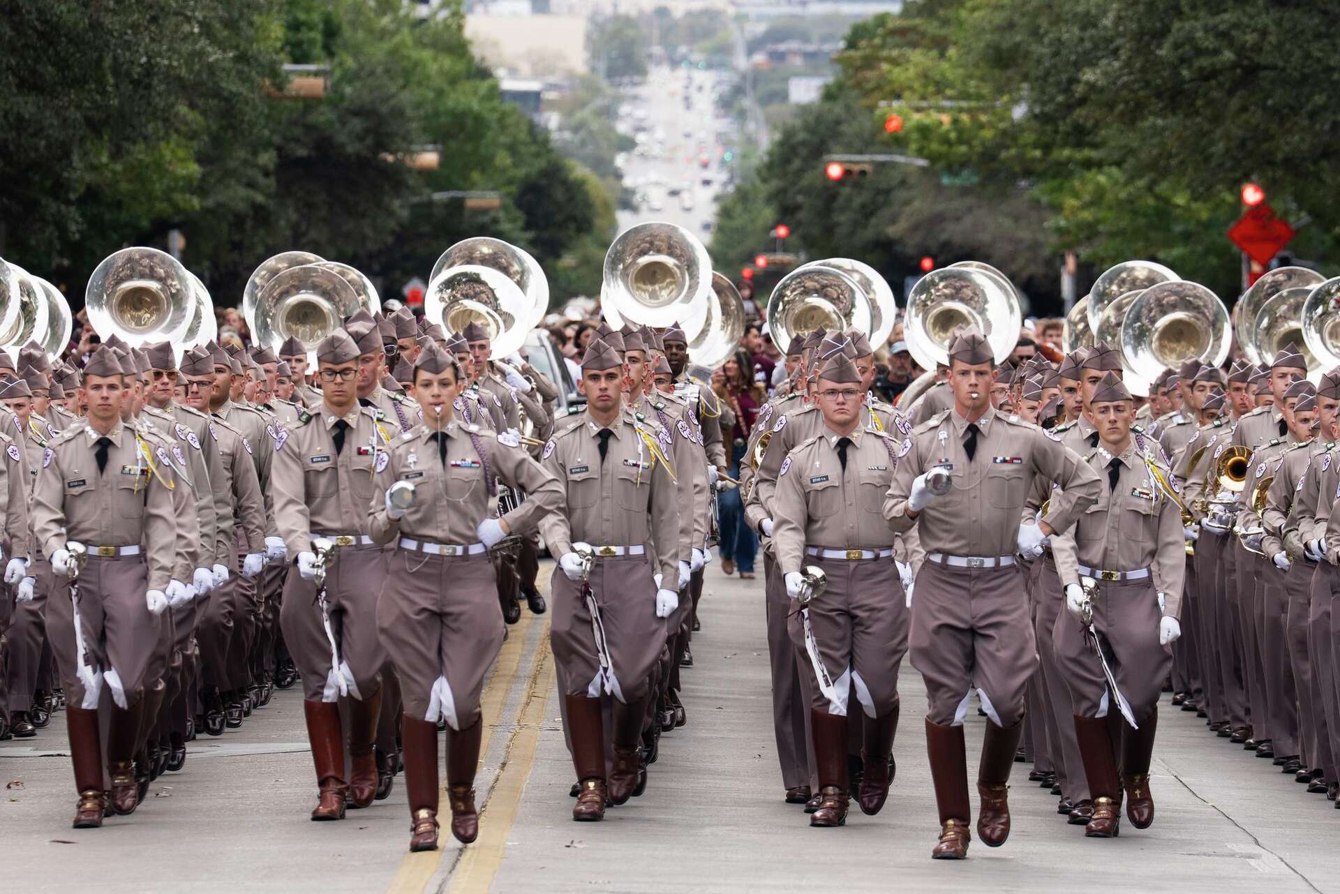 Texas A&M fans take over downtown Austin as Corps marches to Capitol