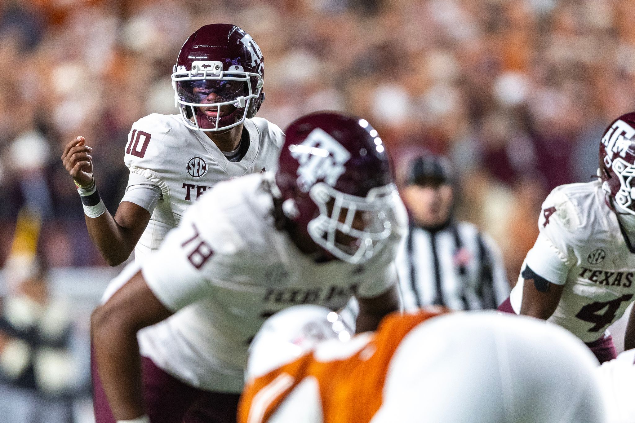 Texas A&M QB Marcel Reed returns after being helped off field in ...