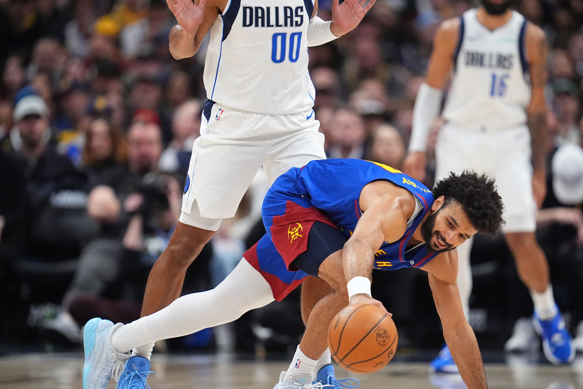 Nuggets' Murray sprains right ankle in 131-121 loss to Mavericks