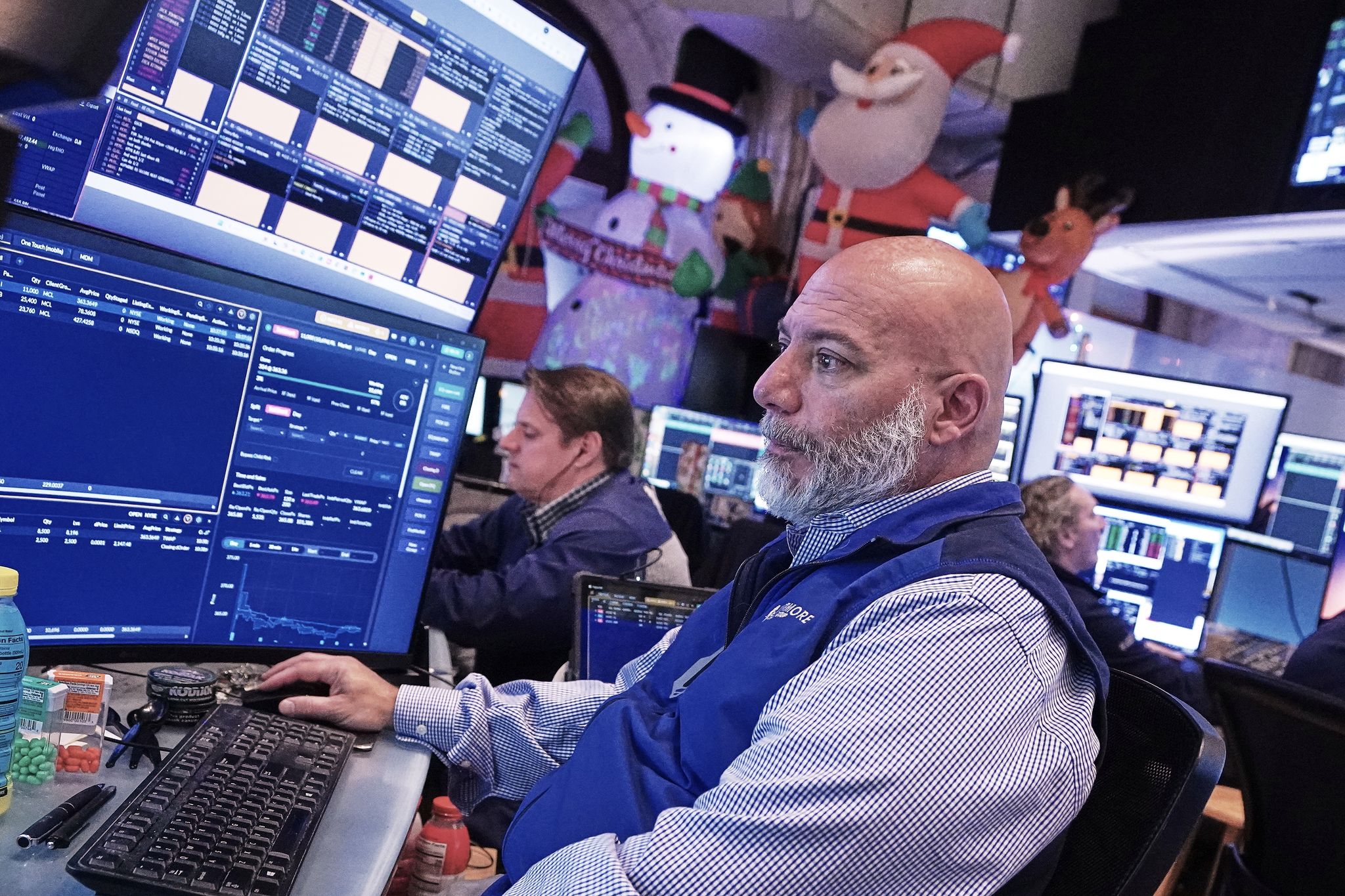 Wall Street holds steadier as bond yields and bitcoin stabilize