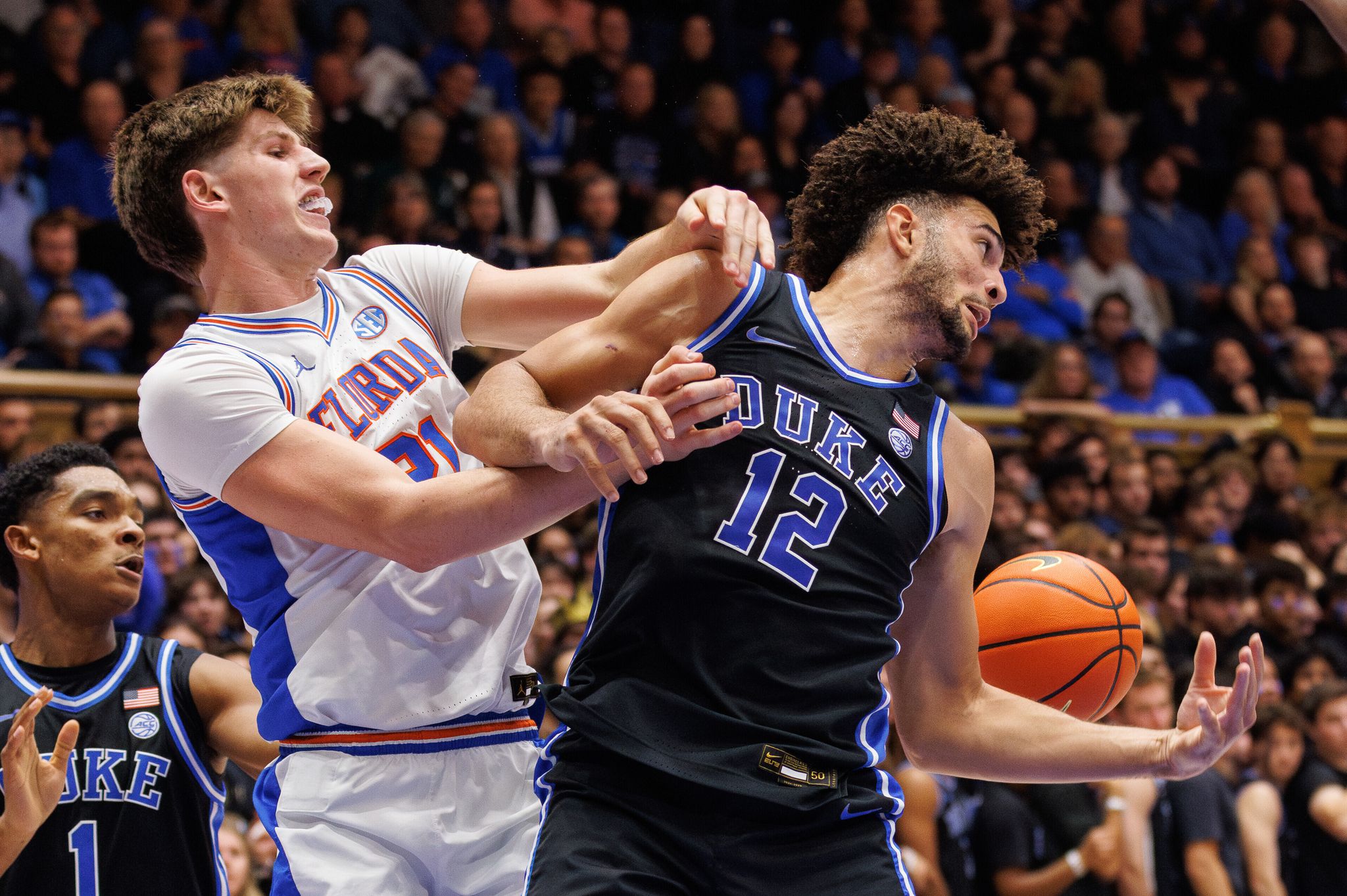 Evans' late 3 helps No. 4 Duke top No. 15 Florida 67-66 in ACC/SEC ...