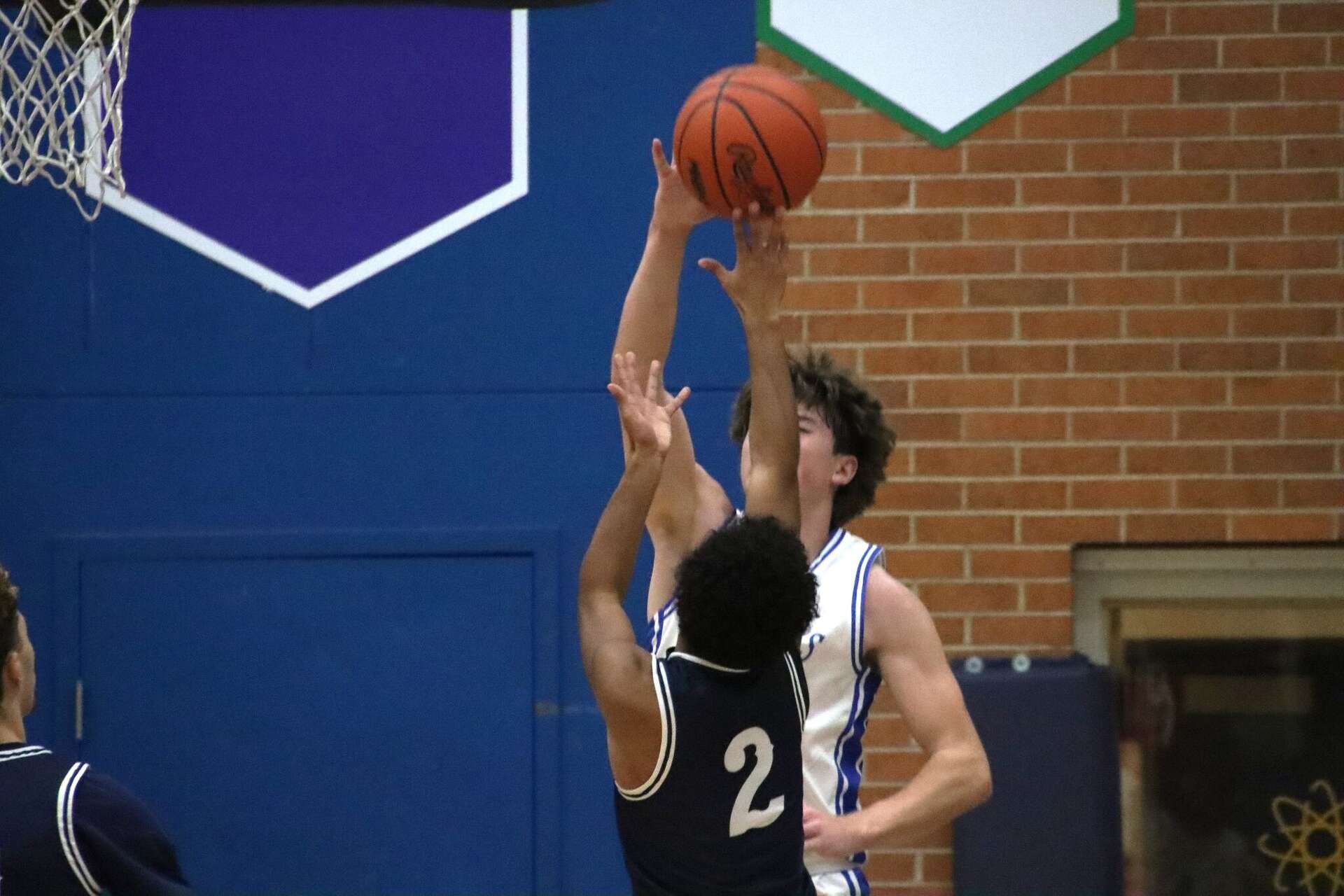 Midland boys drop season opener to John Glenn