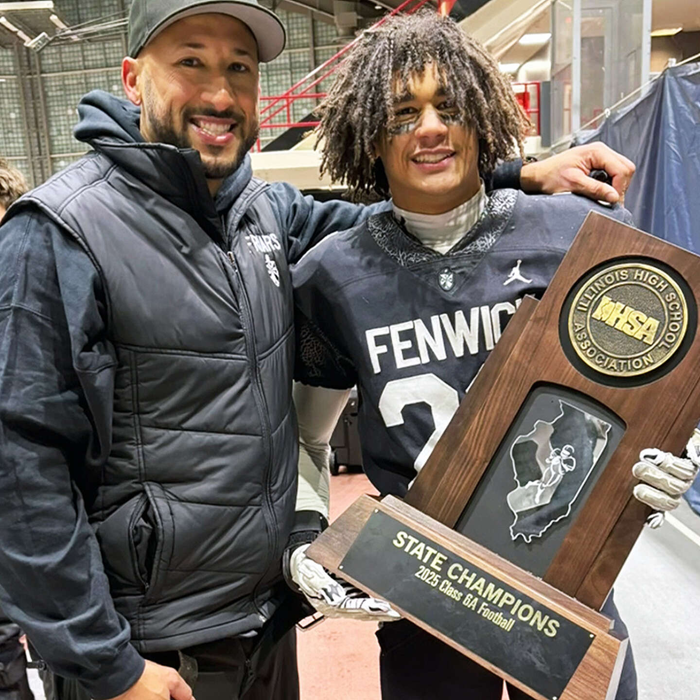 Travis Williams, son Aides, celebrate Fenwick upset of East St. Louis
