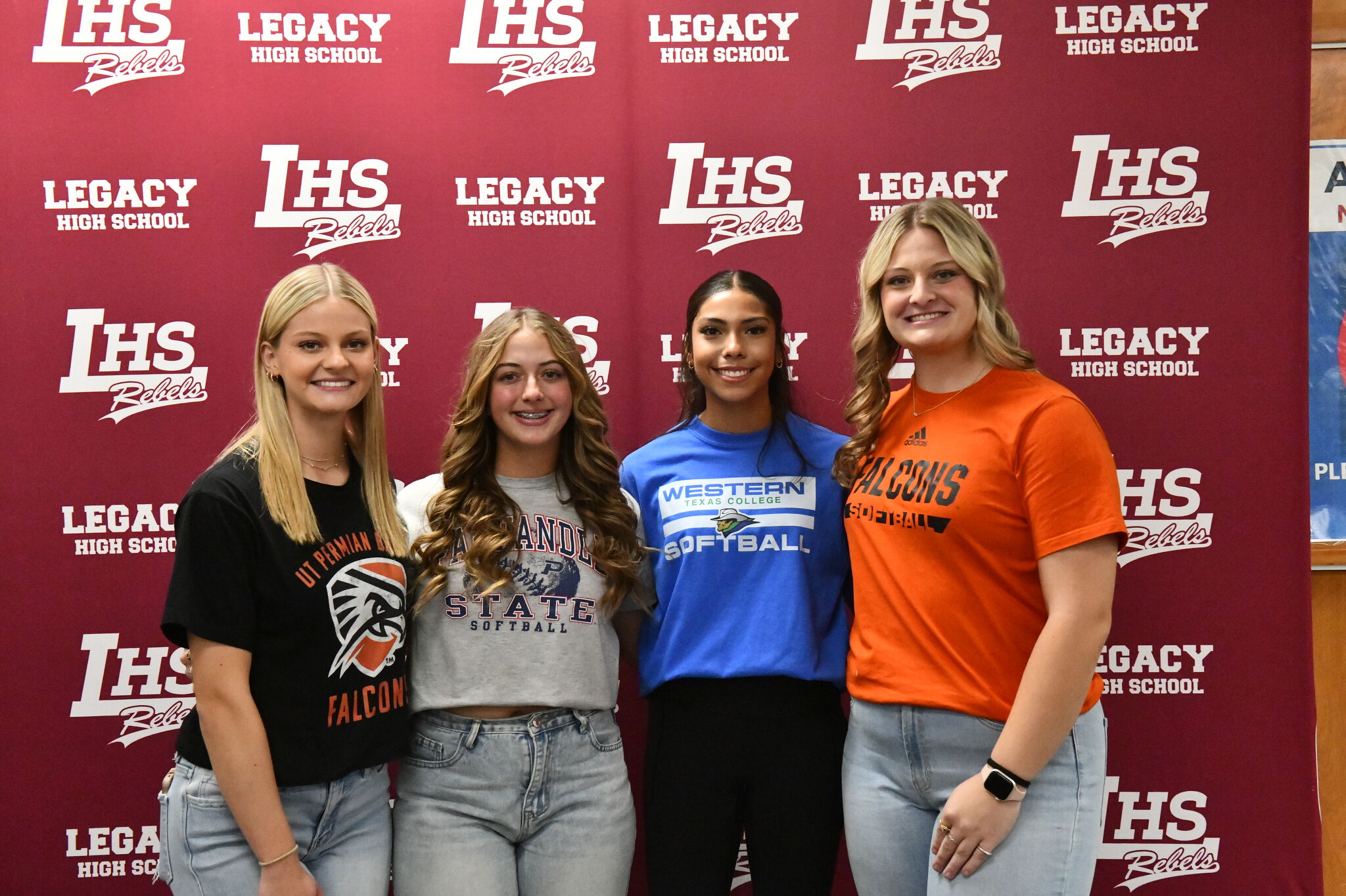 Four Midland Legacy softball players sign with college programs