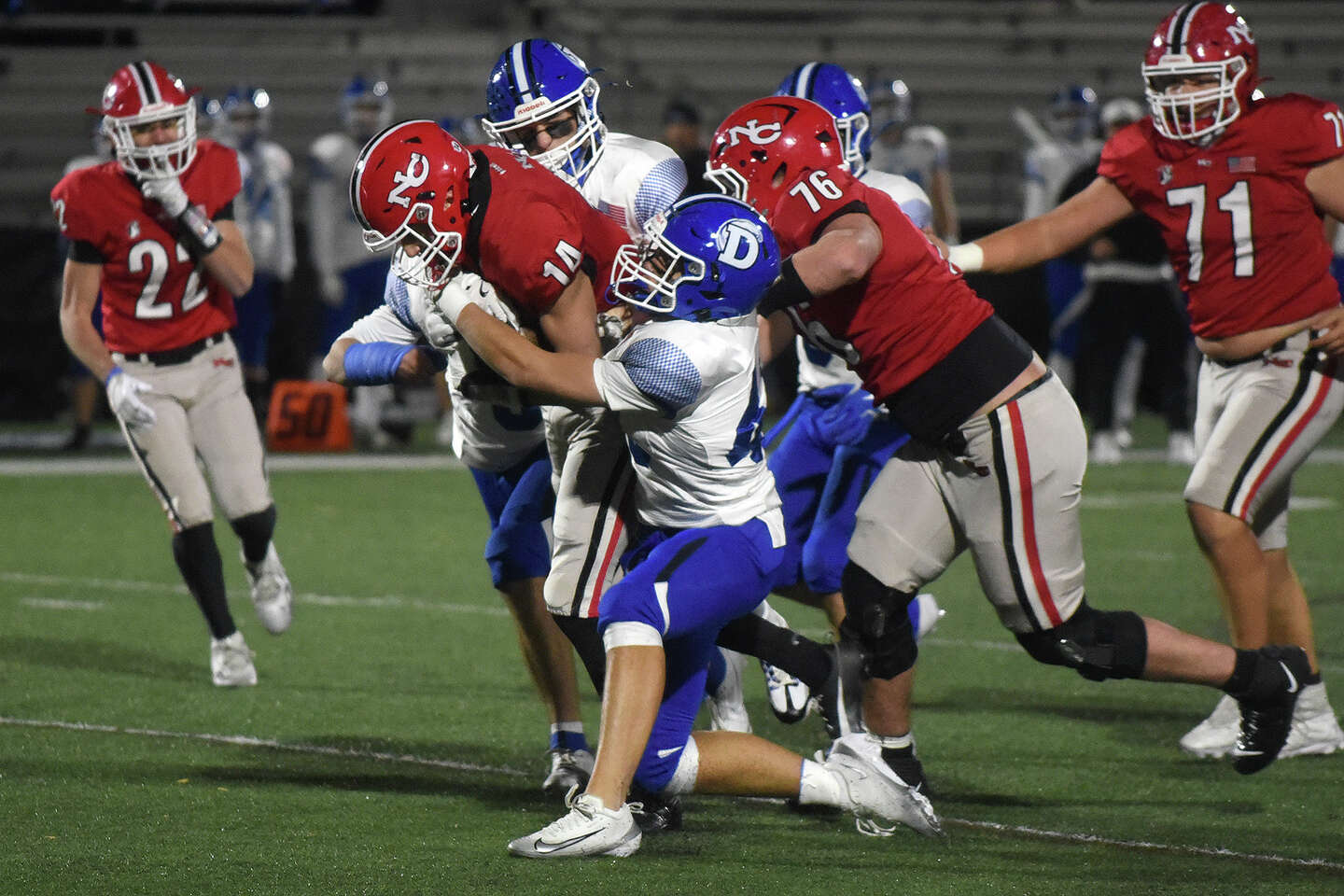New Canaan football defeated Darien in the CIAC Class L quarterfinals