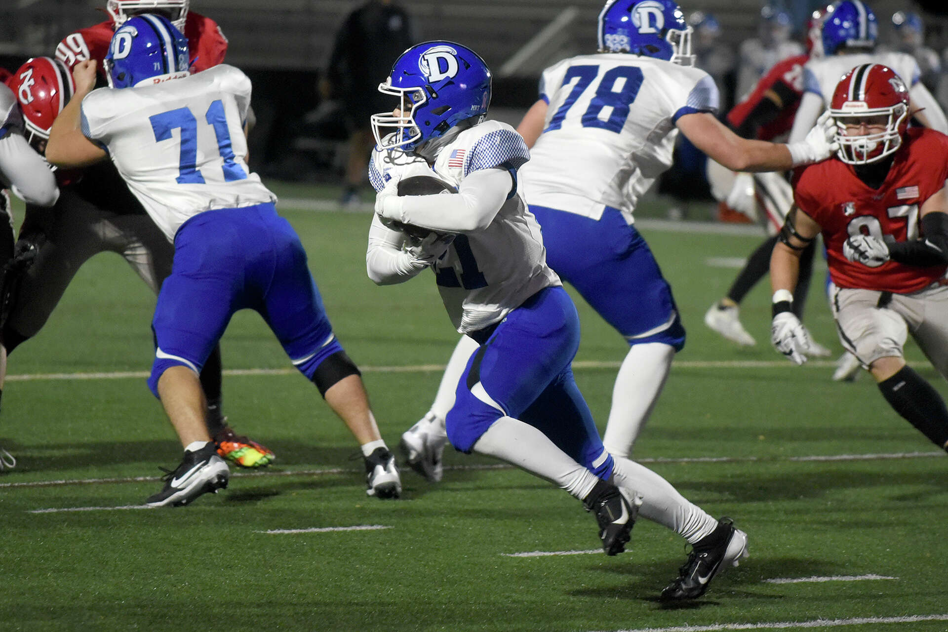 New Canaan football defeated Darien in the CIAC Class L quarterfinals