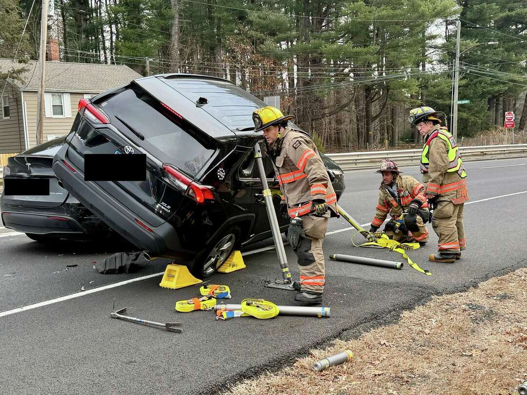 Orange firefighters free person trapped in car after Route 15 crash