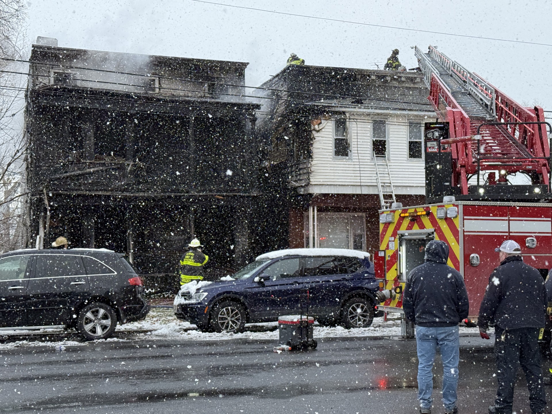 Woman rescued from Western Avenue fire dies from injuries