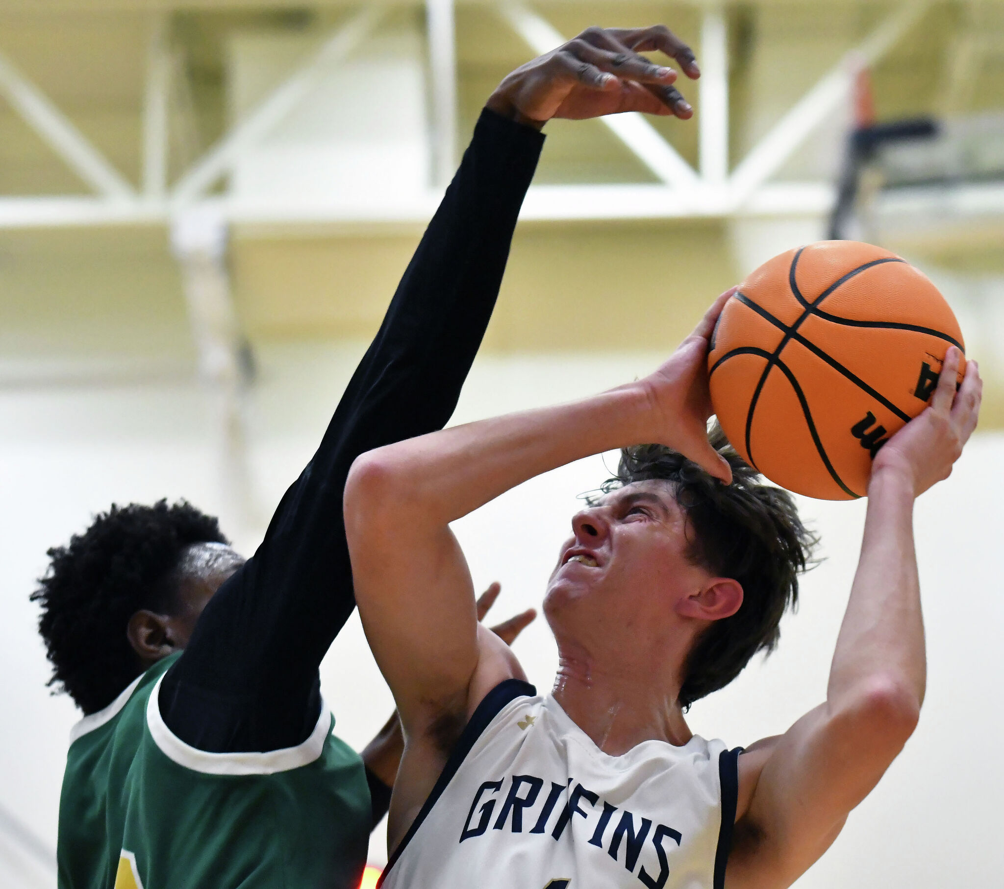 Father McGivney outlasts Metro-East Lutheran in boys basketball