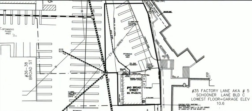 Plan to displace 8 spaces for mixed-use building clears Milford PZC
