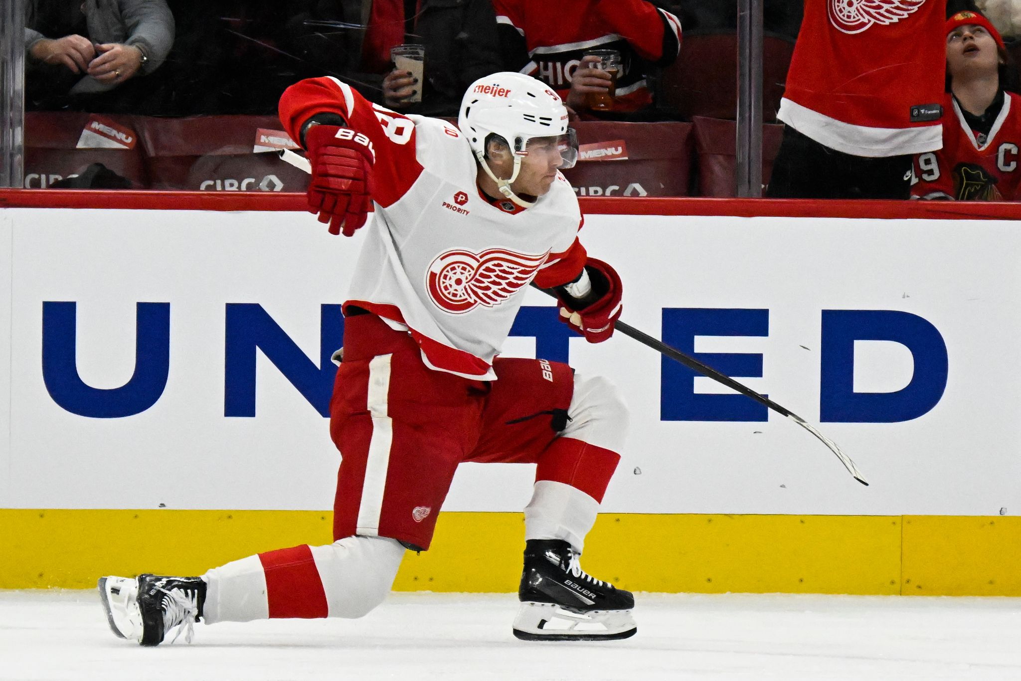 Alex DeBrincat scores twice as Red Wings shut out Blackhawks 4-0
