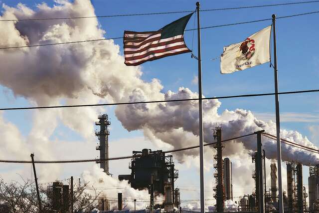Phillips 66 Wood River Refinery flares light up sky