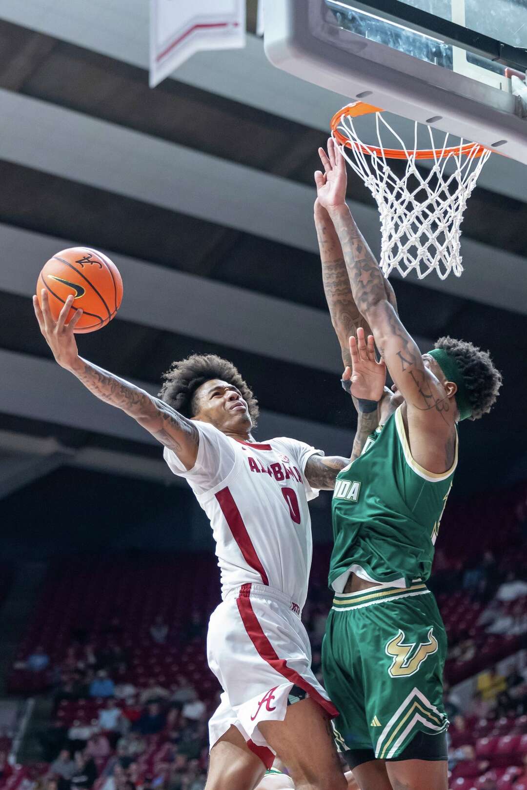 Labaron Philon, Aden Holloway power No. 16 Alabama past South Florida ...