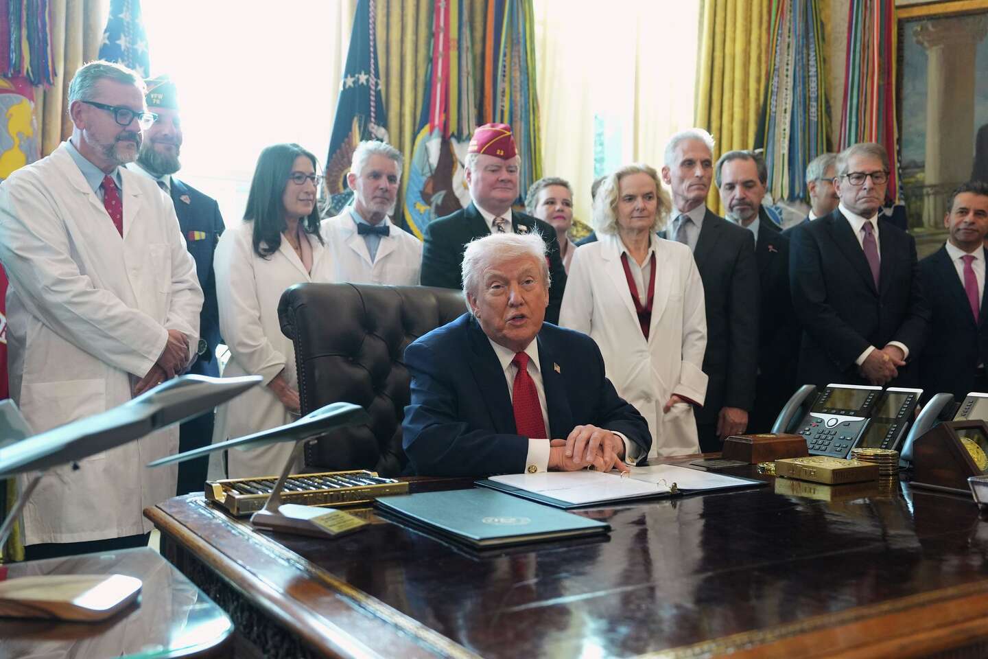 Trump signs executive order that could reclassify marijuana as a less ...