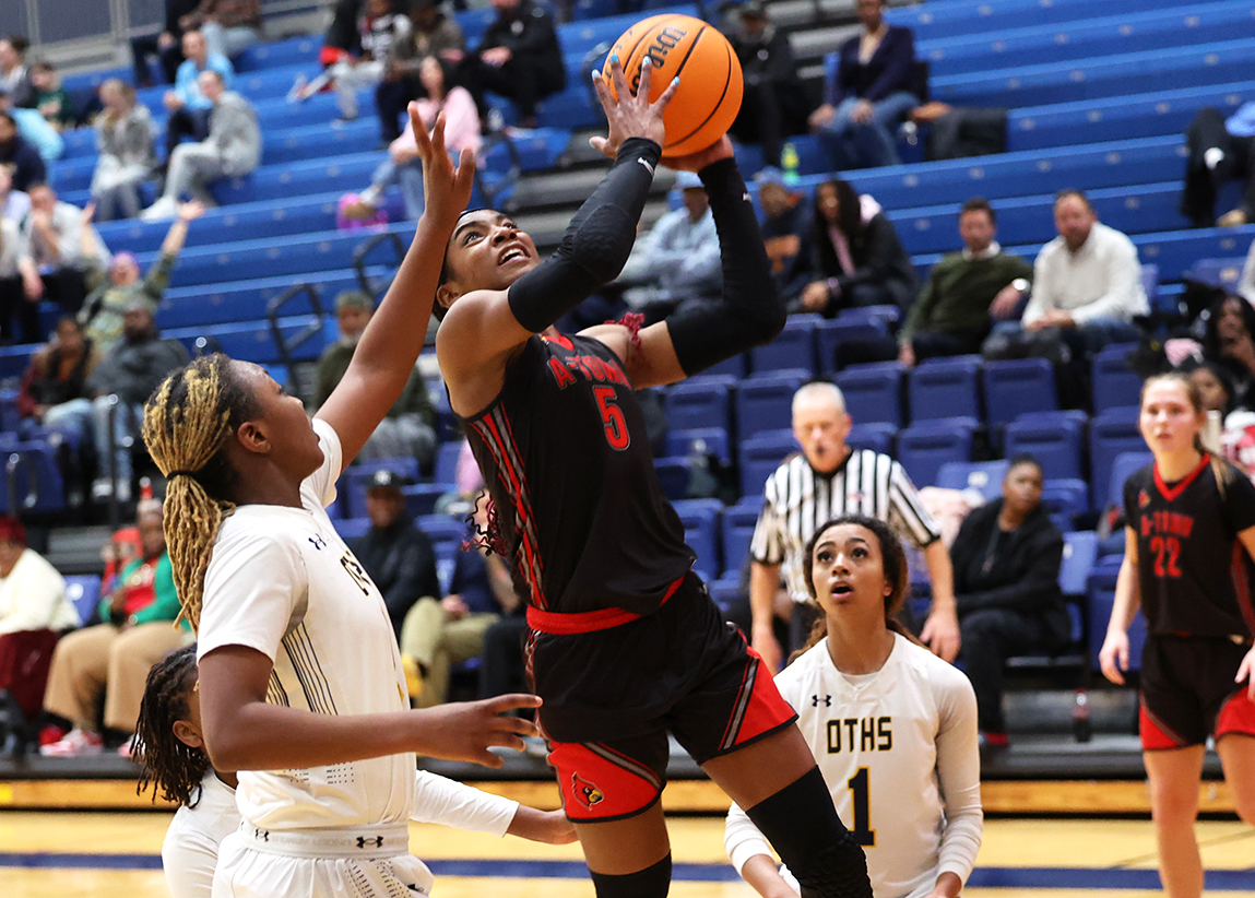 Lacey takes over late, Alton girls close strong to put away O'Fallon