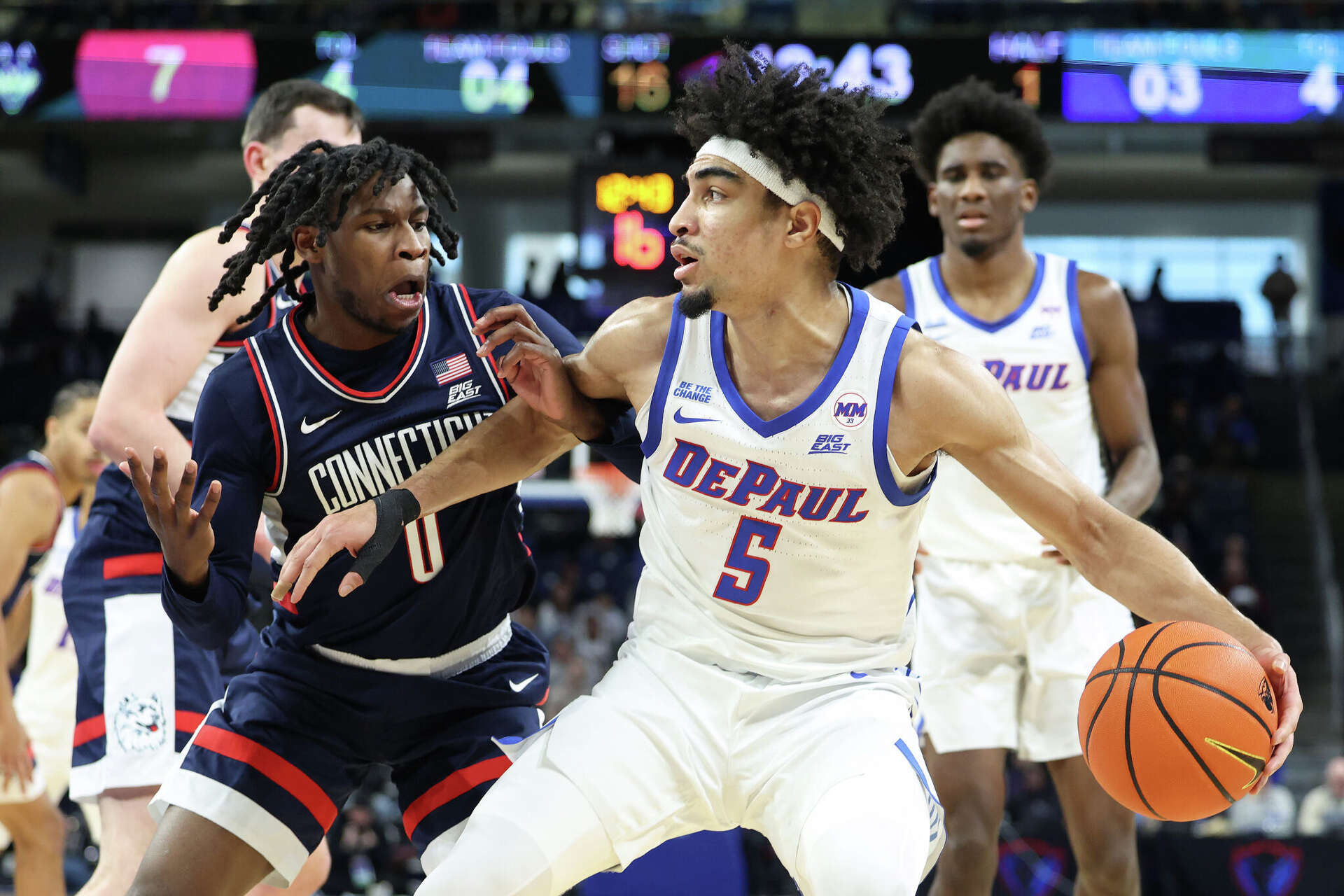 UConn guard gets sick on court, but Huskies beat DePaul