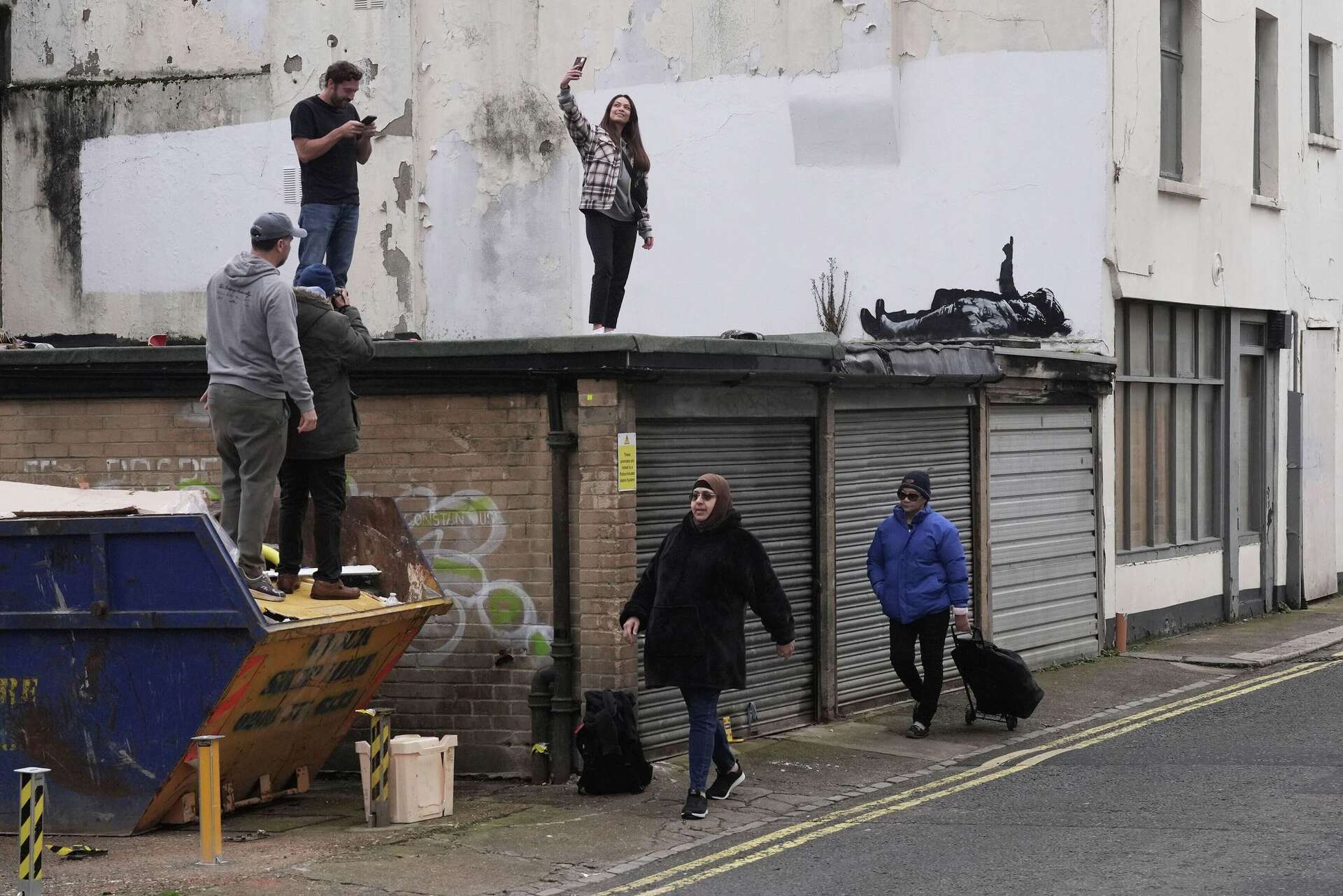 Banksy unveils new art in London following speculation over murals ...