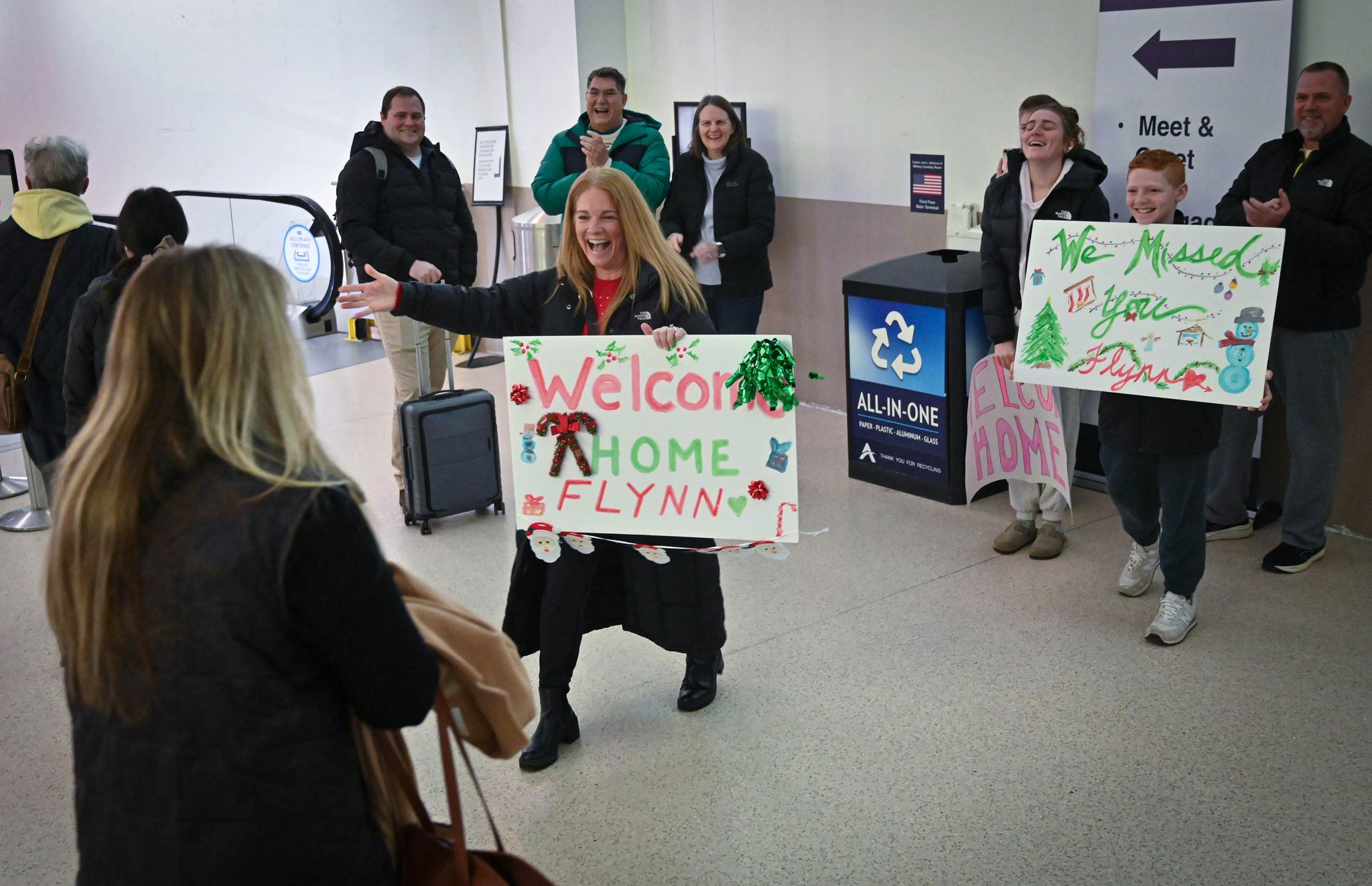 Photos: Holiday homecoming at Albany airport