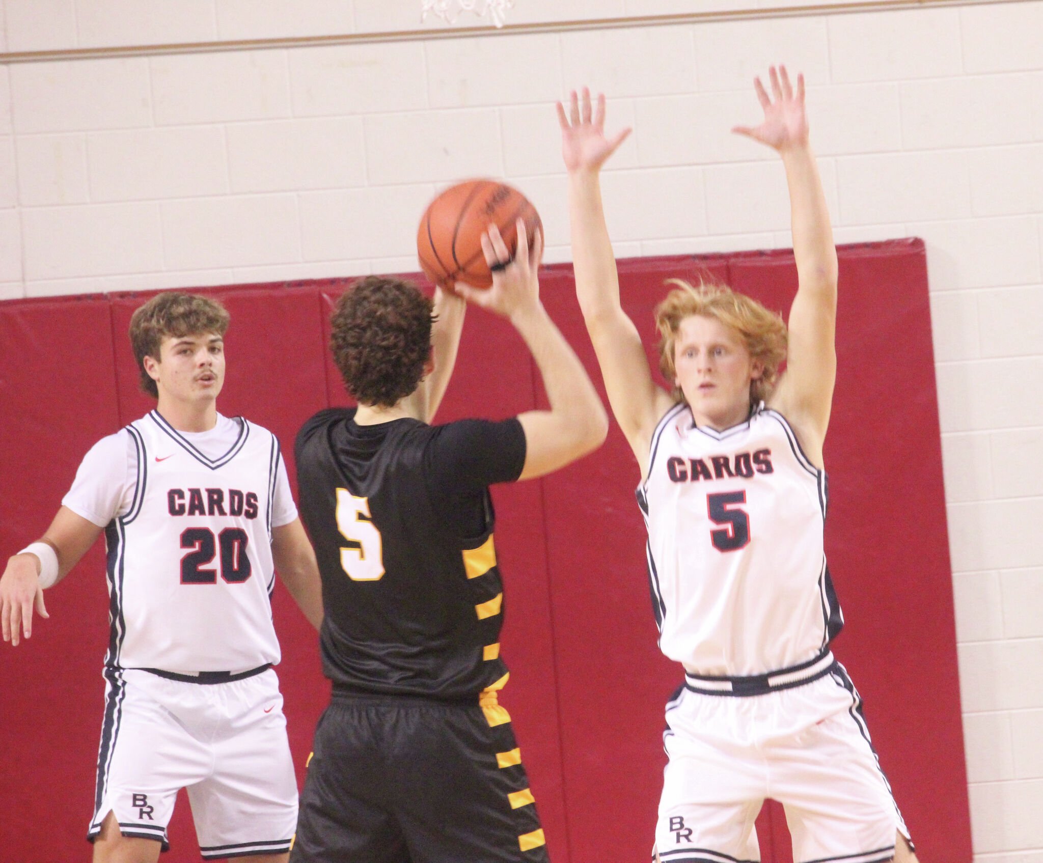 Craven a key contributor for basketball, football teams