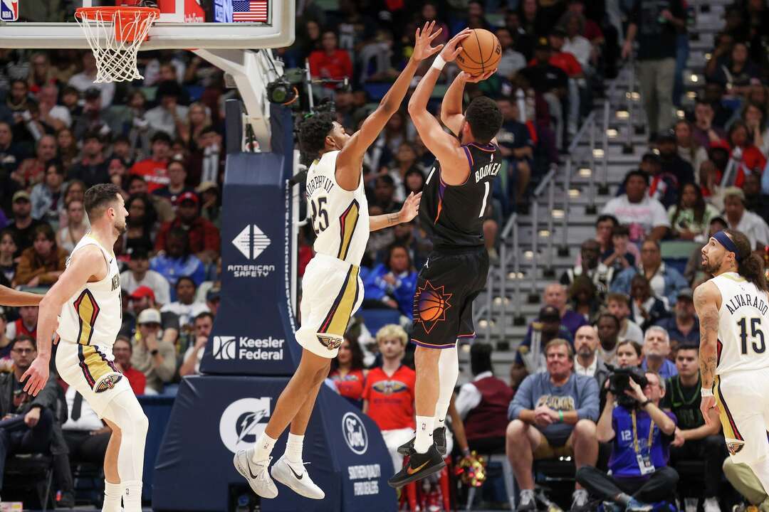 Booker scores 30 points and leads the Suns past the Pelicans, 115-108