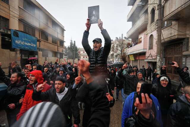 Hundreds mourn in Syria's Homs after deadly mosque bombing