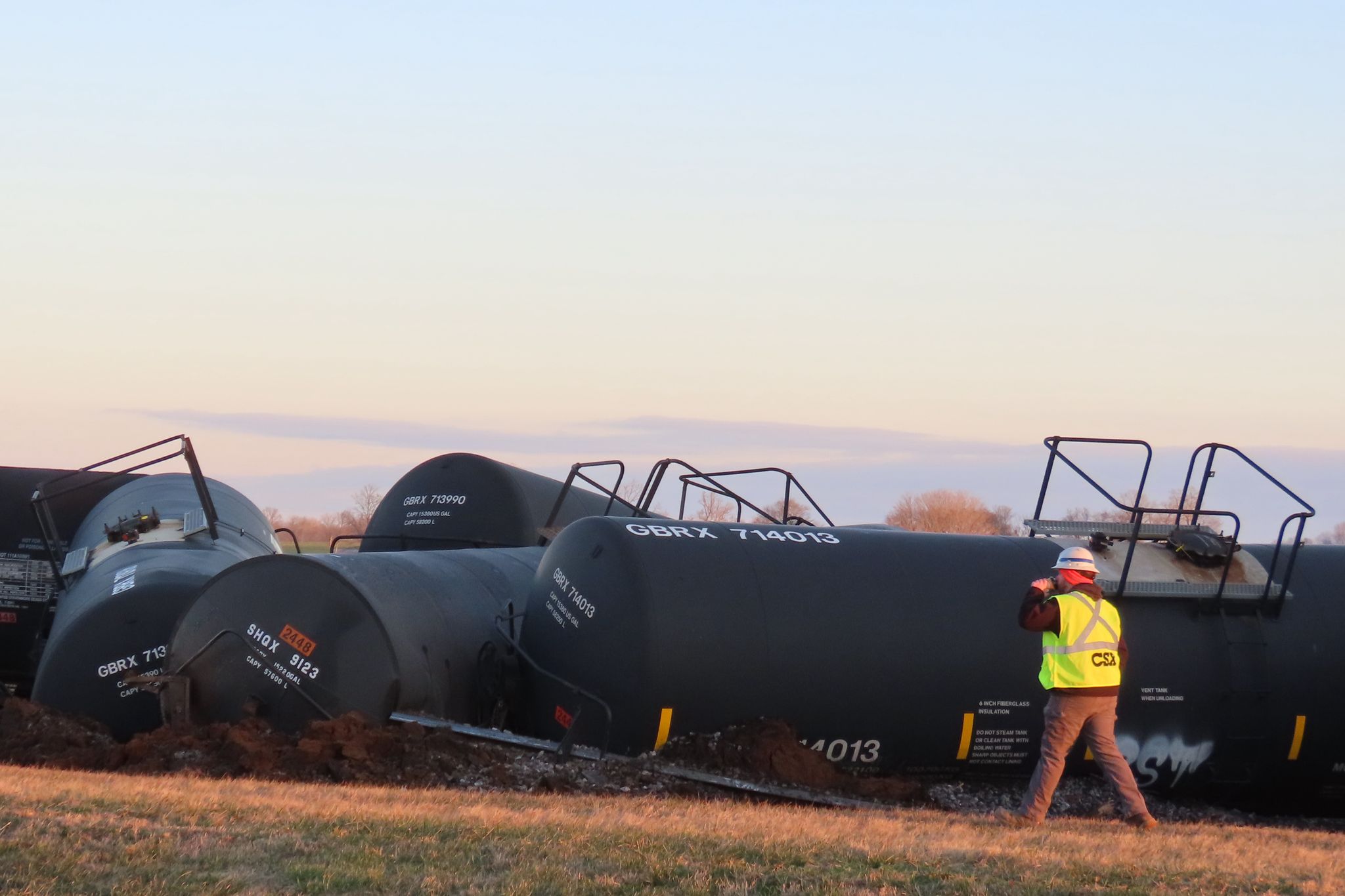Derailed train in Kentucky causes a chemical leak and sparks a fire