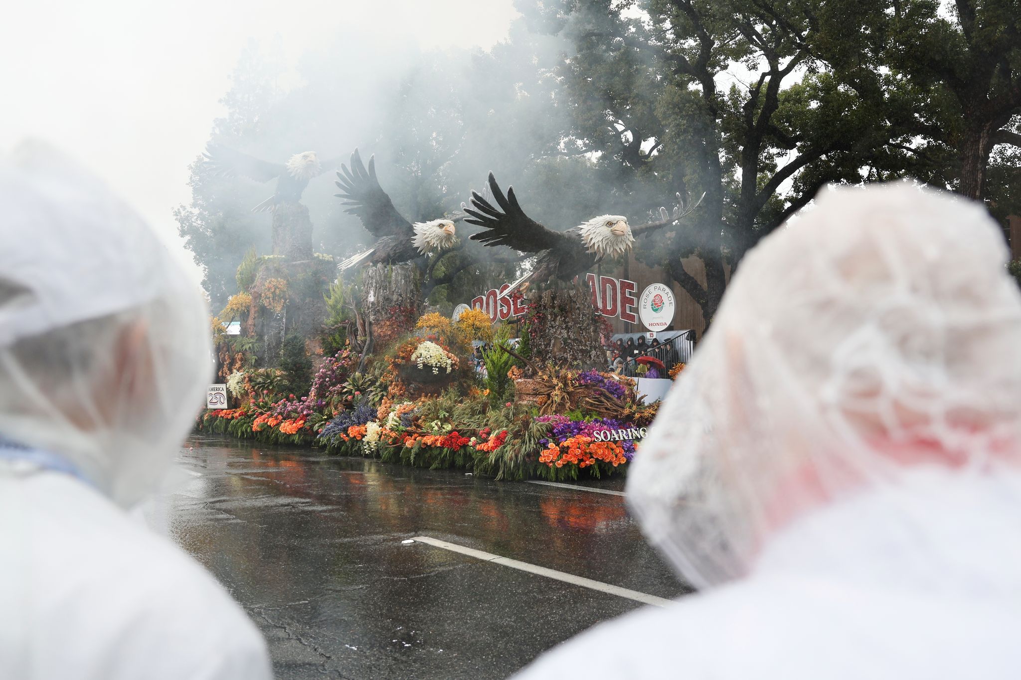 Rain soaks Rose Parade in California and snow squalls hit Midwest and ...