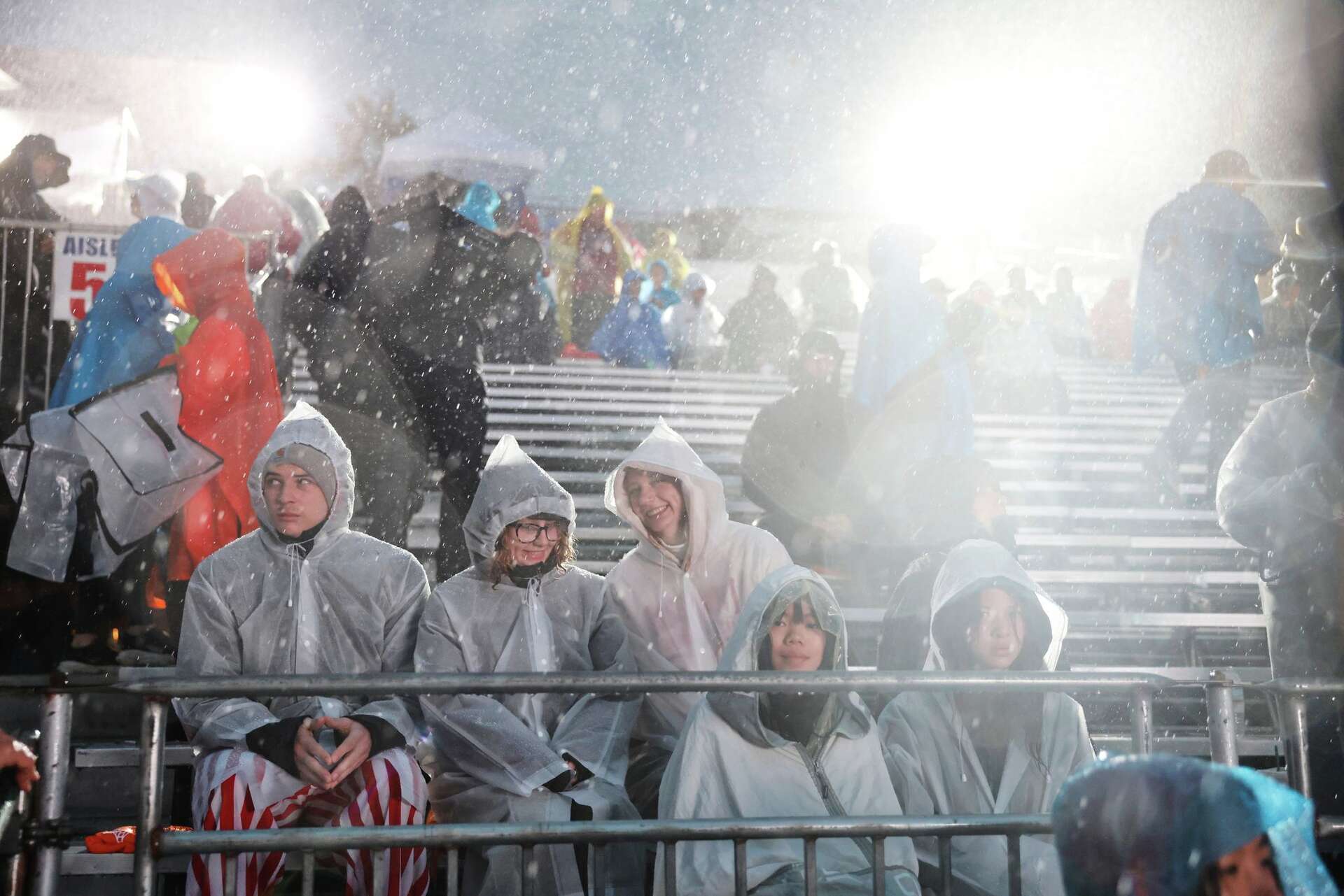 Rain soaks Rose Parade in California and snow squalls hit Midwest and ...