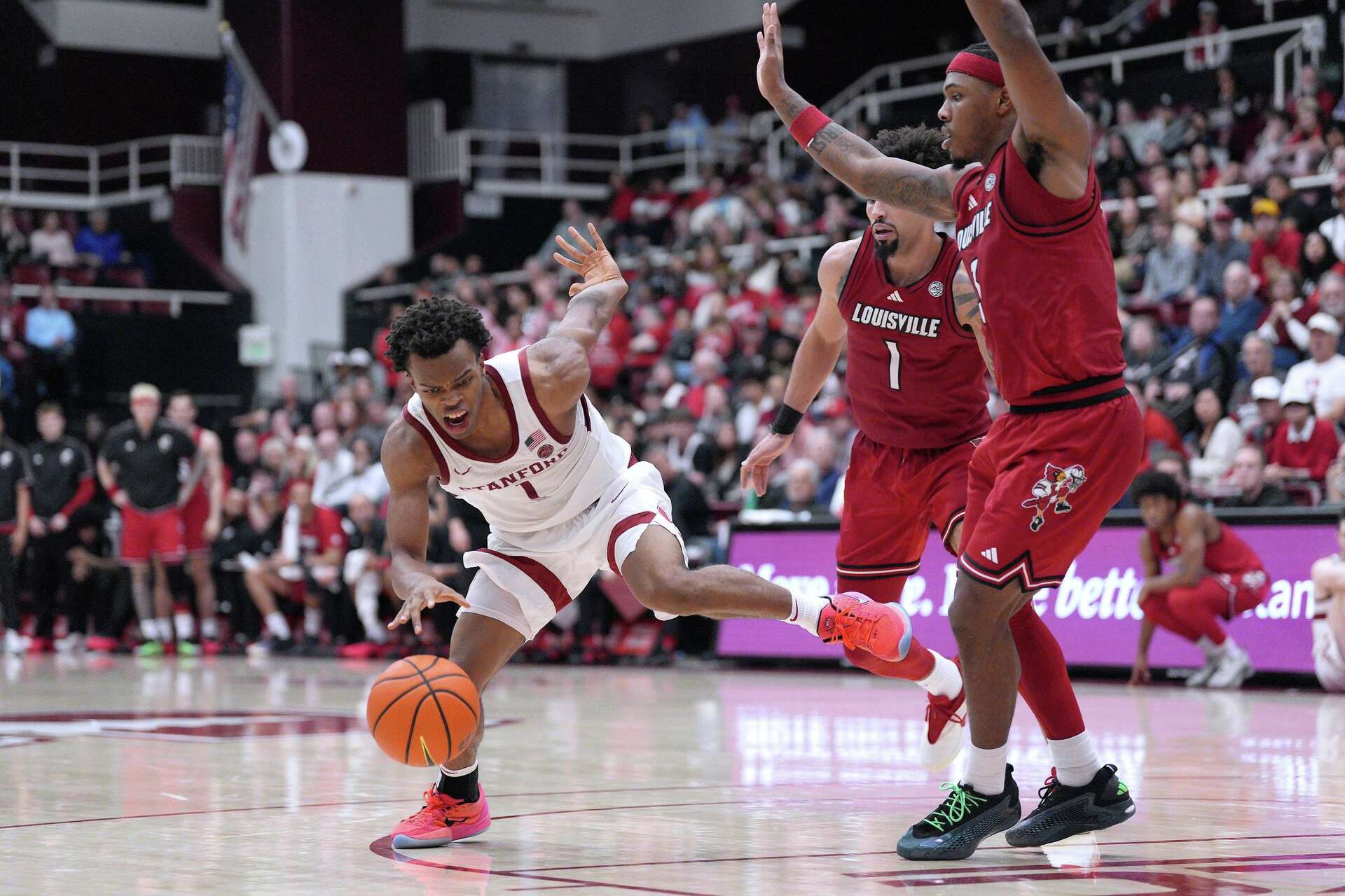 Freshman Ebuka Okorie leads Stanford to an 80-76 win over No. 16 Louisville