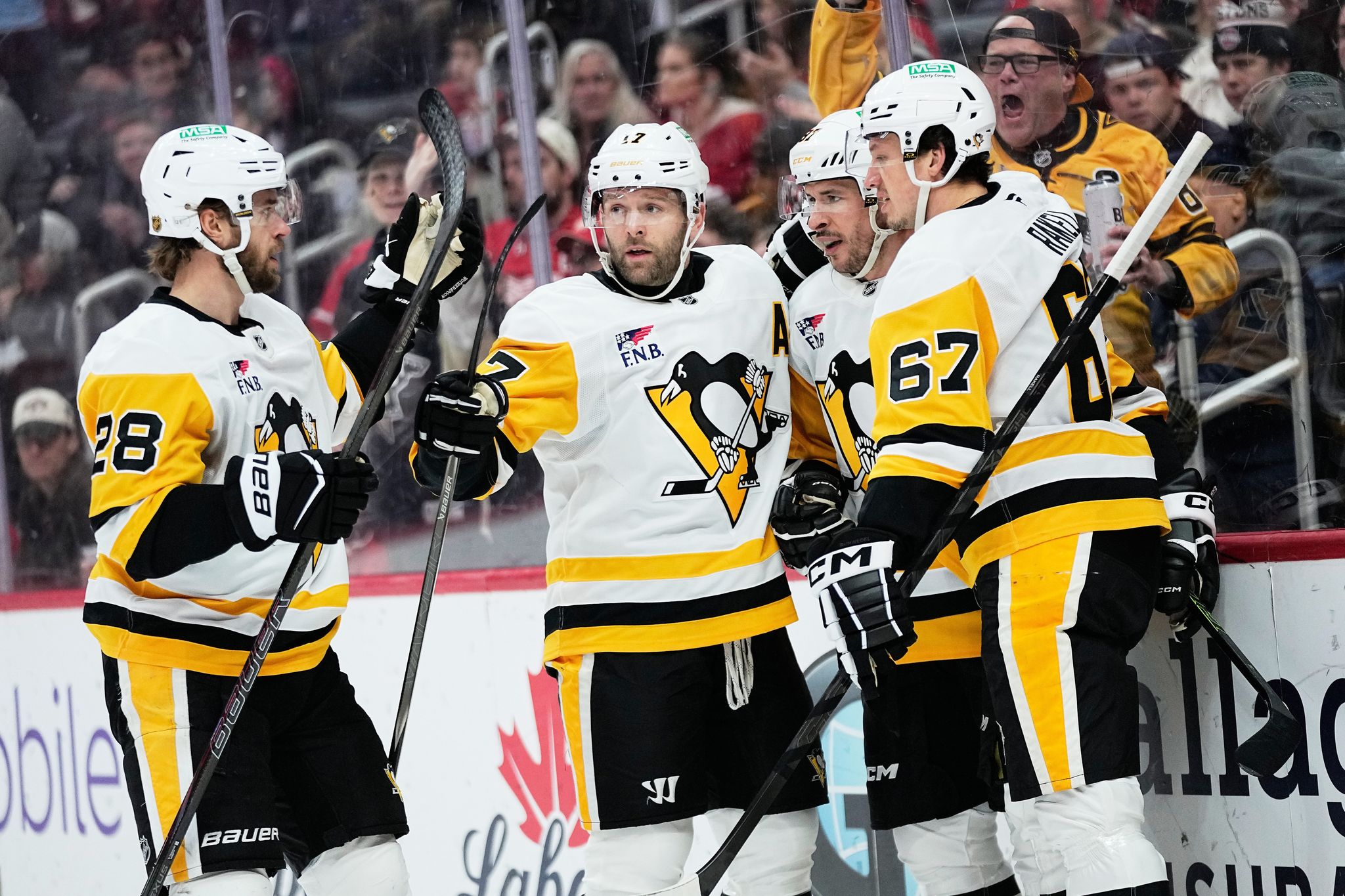 Bryan Rust and Yegor Chinakhov send the streaking Penguins past the Red ...
