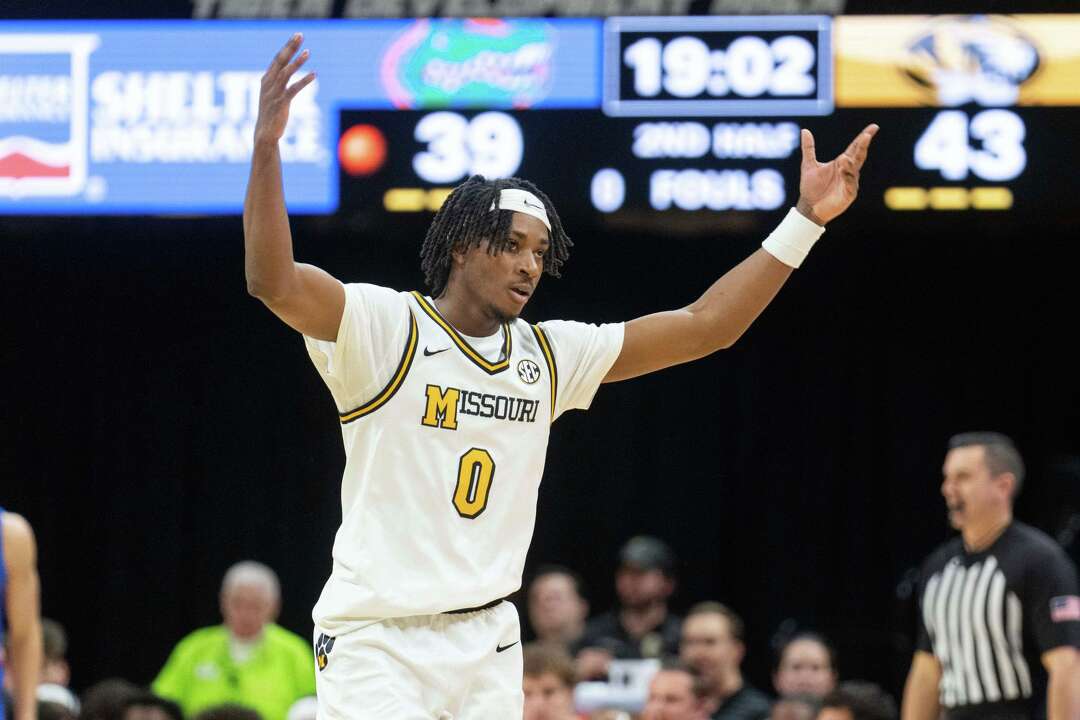Missouri holds off No. 22 Florida 76-74 in SEC opener
