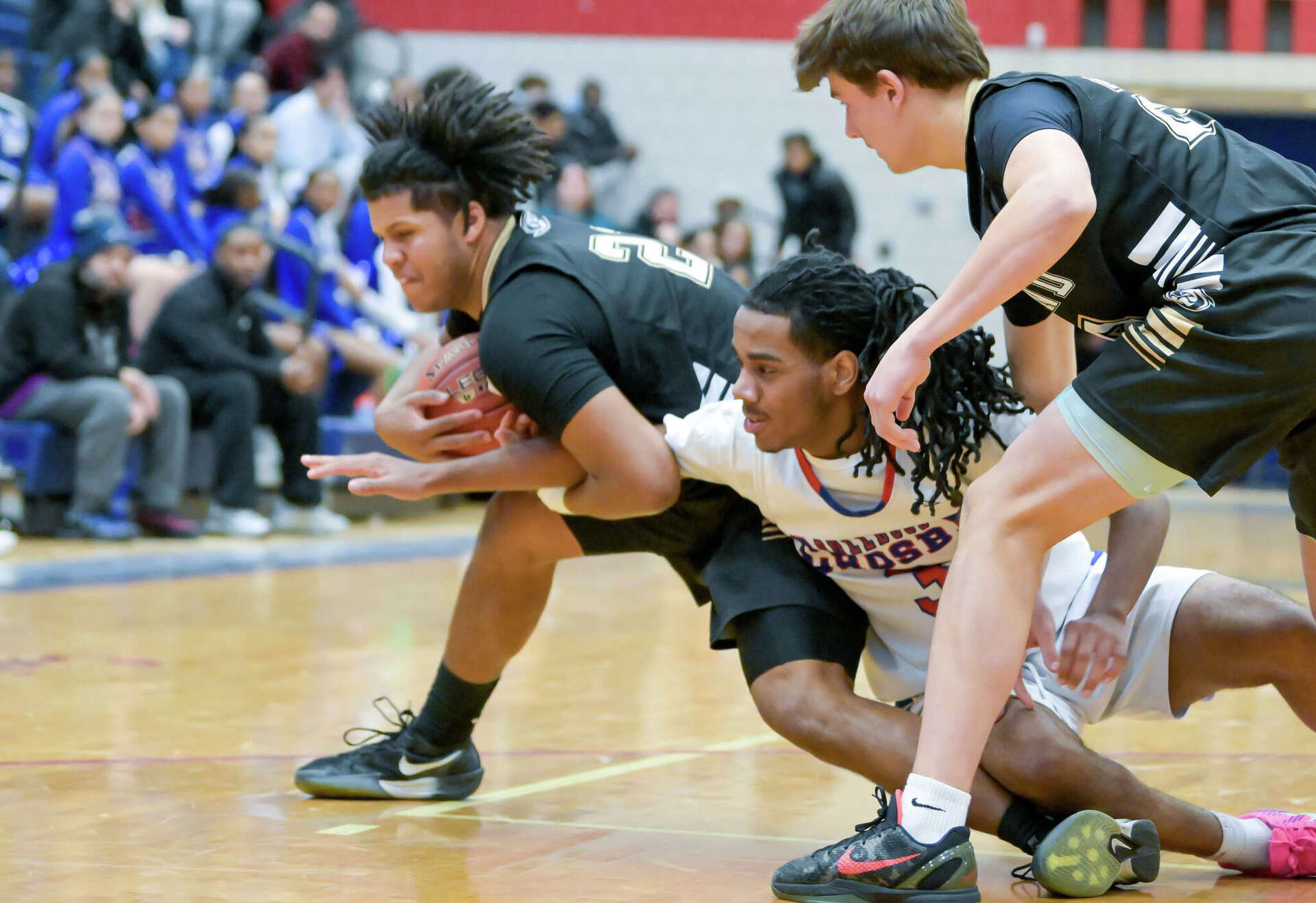 CT championship football stars fare quite well as basketball players
