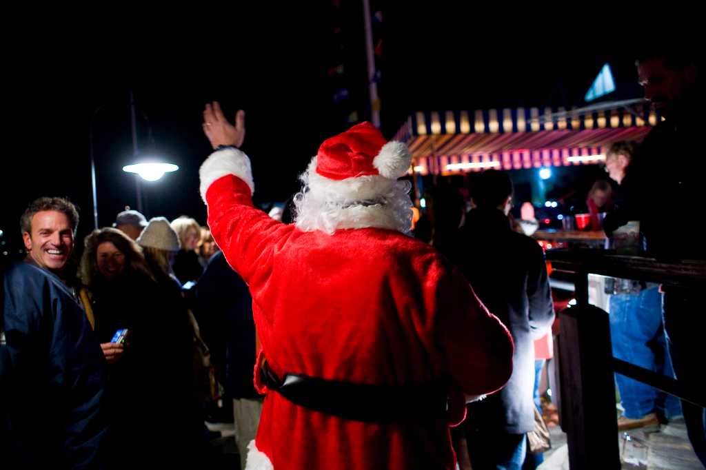 Parade of boats ushers in Christmas season