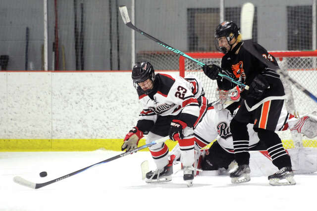 Photos from New Canaan boys hockey's win over Ridgefield