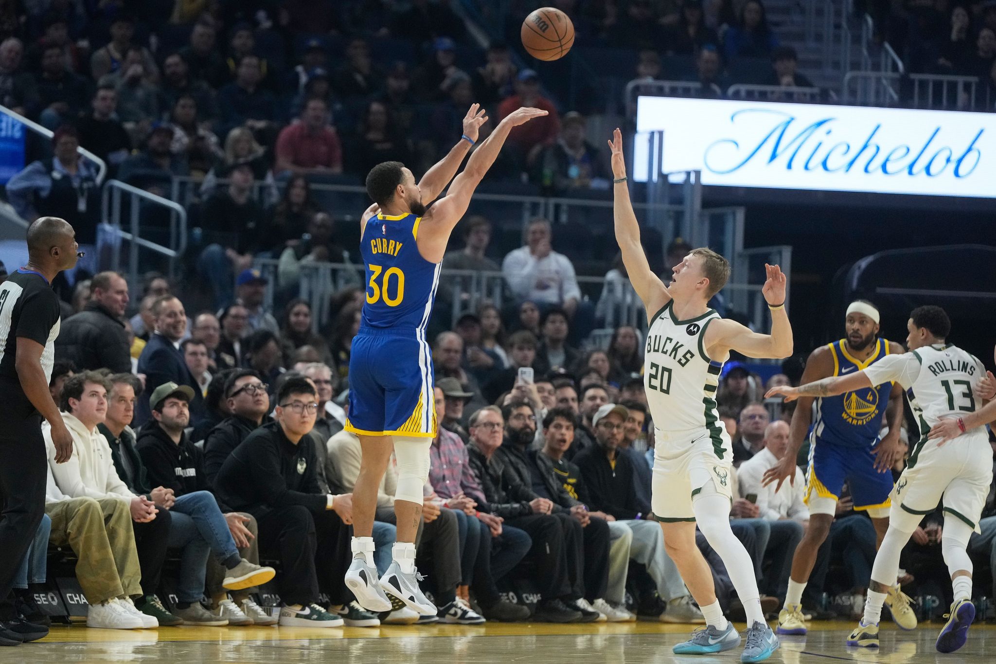 Stephen Curry, Jimmy Butler lead Warriors past Bucks, 120-113