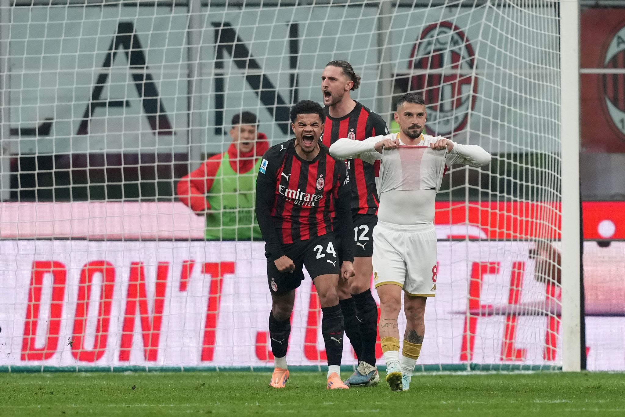 AC Milan saved by Genoa's missed penalty in dramatic 1-1 draw