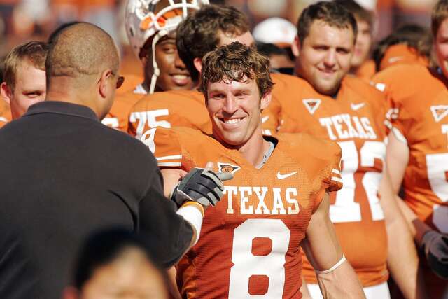 Texas star throws up 'Hook 'Em Horns' sign despite severe burns