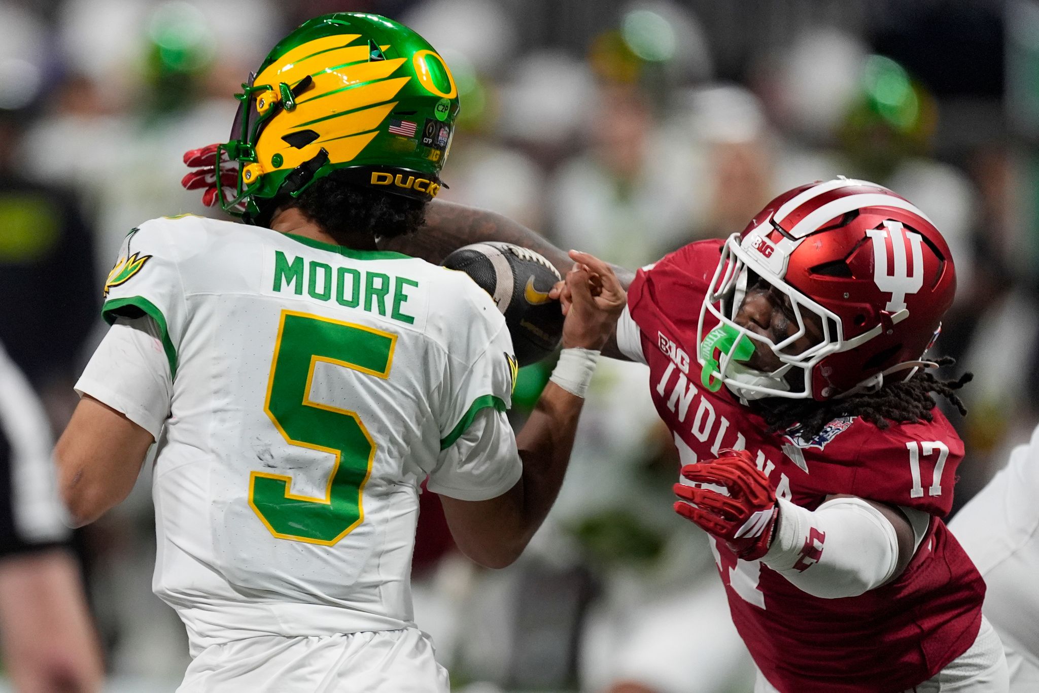 Dante Moore and the Oregon Ducks self-destruct in 56-22 Peach Bowl loss ...