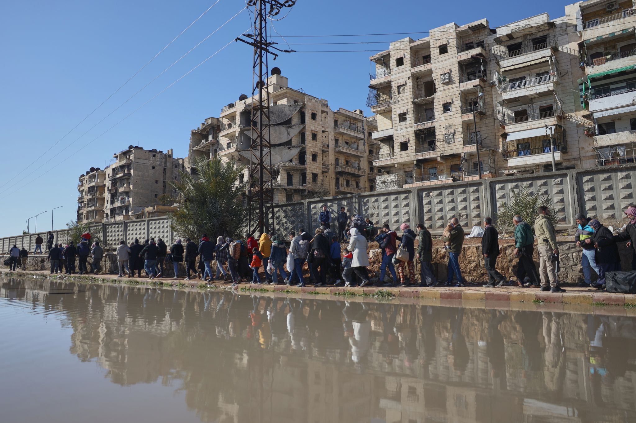 Kurdish fighters evacuated from Aleppo after days of violent clashes