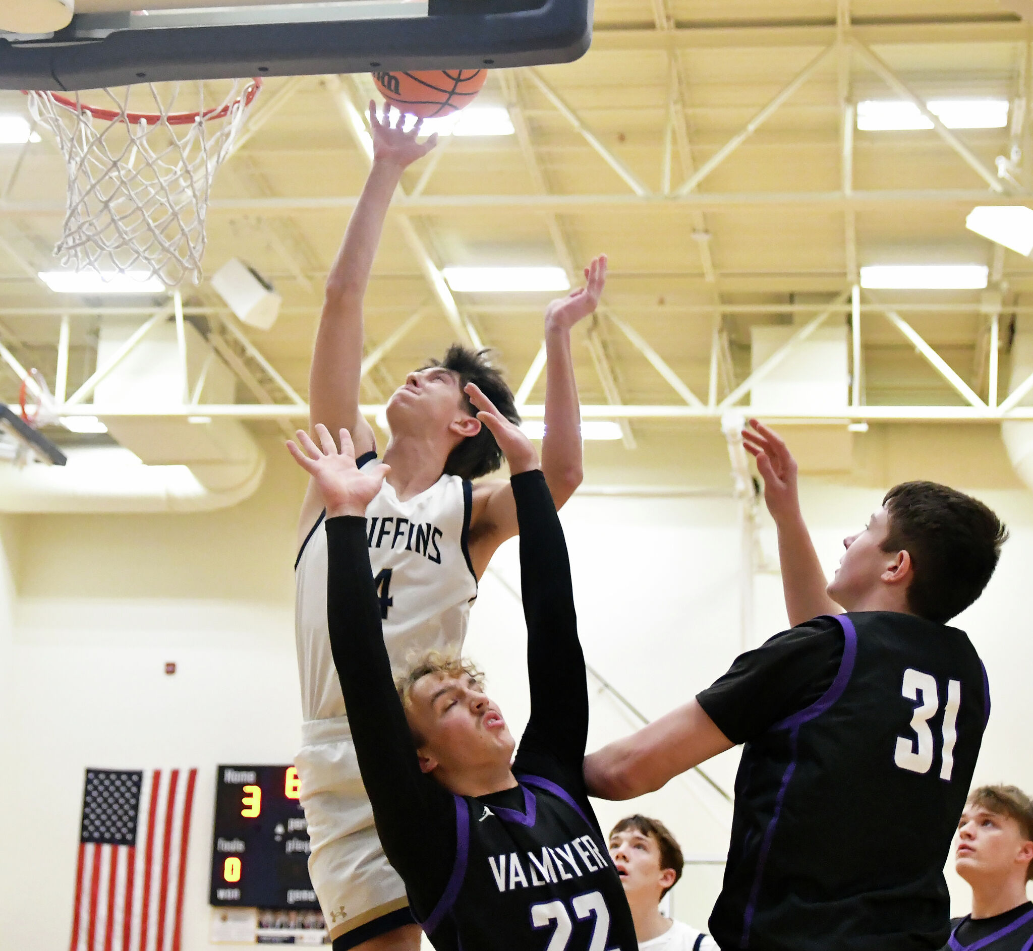 Father McGivney boys basketball takes on Valmeyer