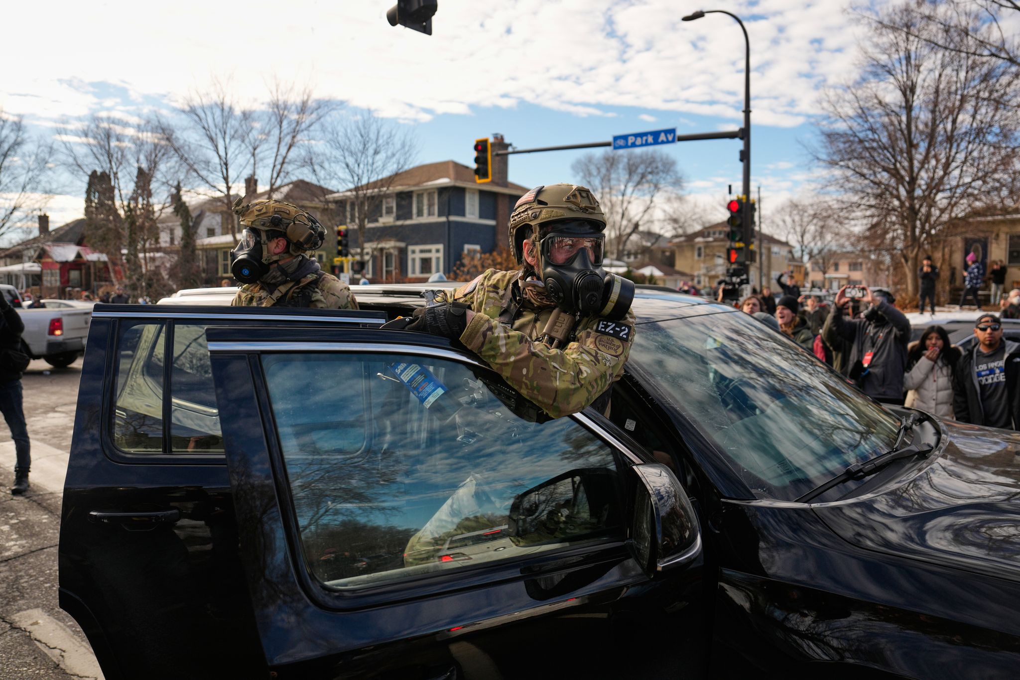 Photos of tensions between federal officers and locals in Minneapolis