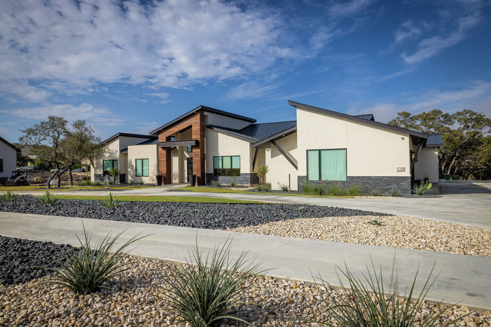 Boerne custom home blends rustic warmth with modern edge