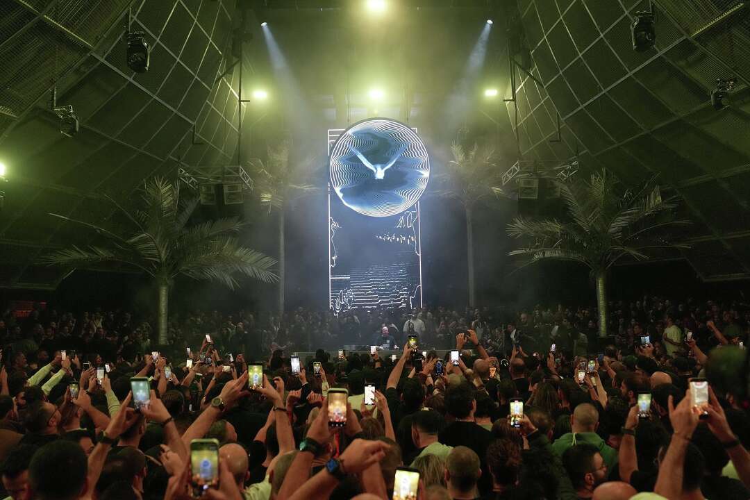 Priest by day, DJ by night: Padre Guilherme's rave in Beirut draws ...