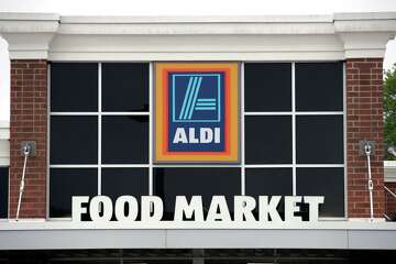 Bargain grocer Aldi seizes the moment and expands with consumers hurting