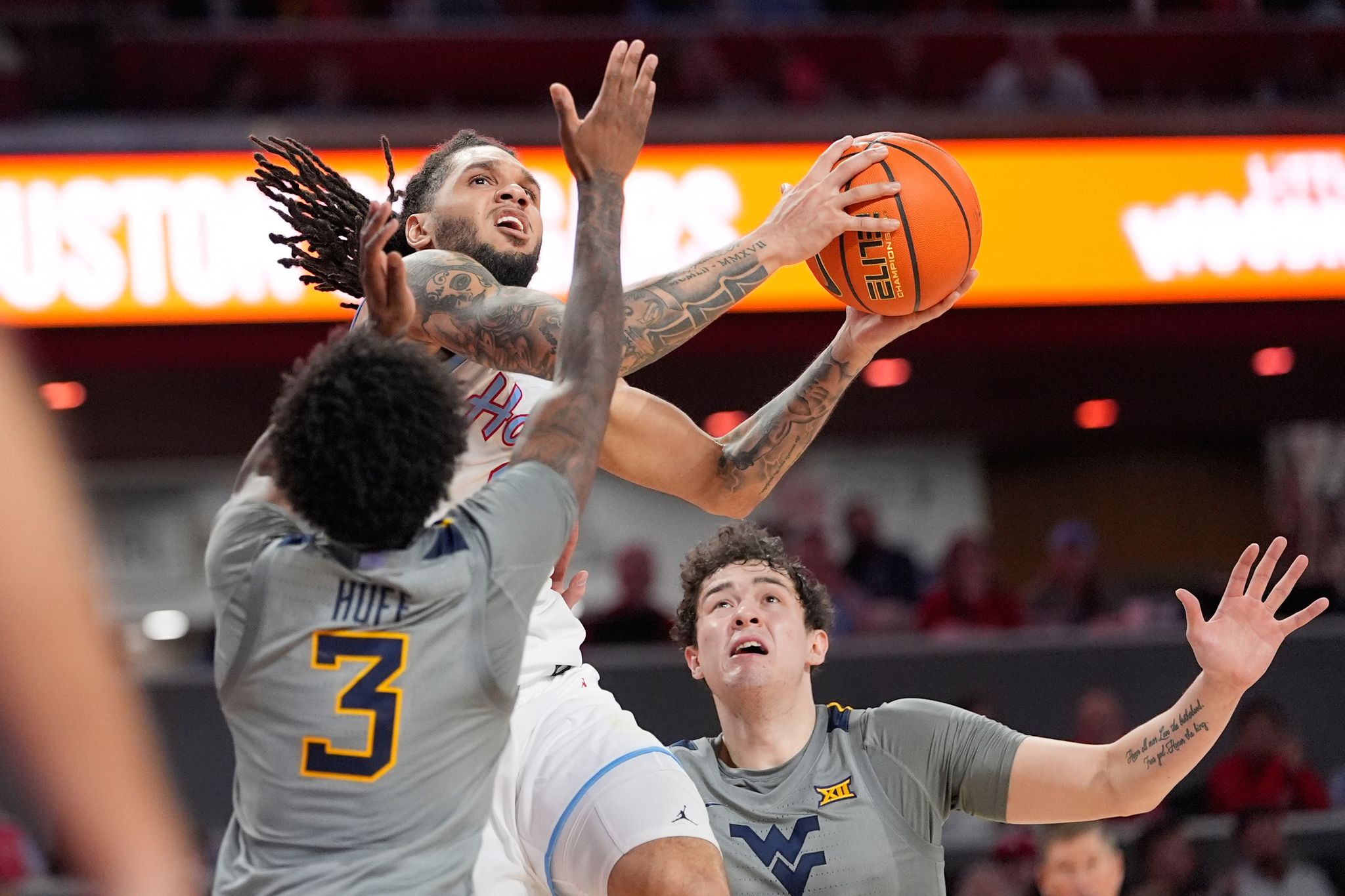 Milos Uzan's 17 points leads No. 7 Houston in 77-48 win over West Virginia
