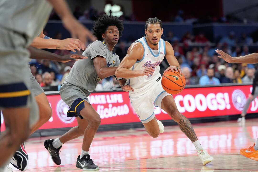 Milos Uzan's 17 points leads No. 7 Houston in 77-48 win over West Virginia