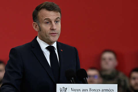 France's Macron laughs off 'harmless' eye condition as he addresses troops