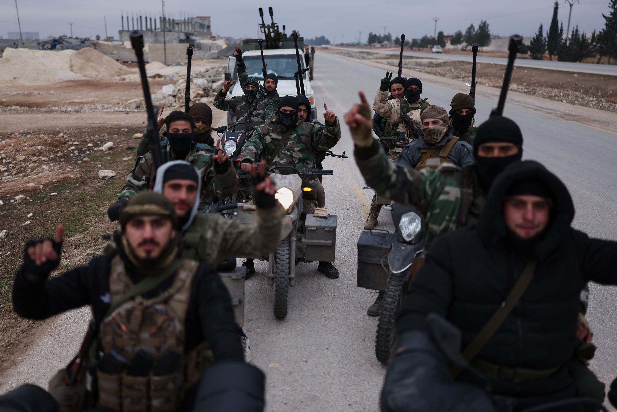 Syrian government forces enter northern towns after Kurdish fighters ...