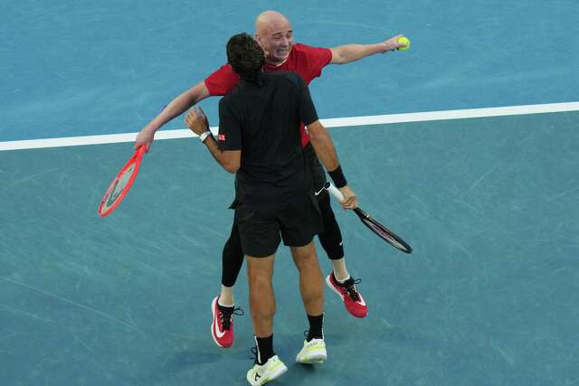 Roger Federer steals the show at Australian Open's first formal opening ...