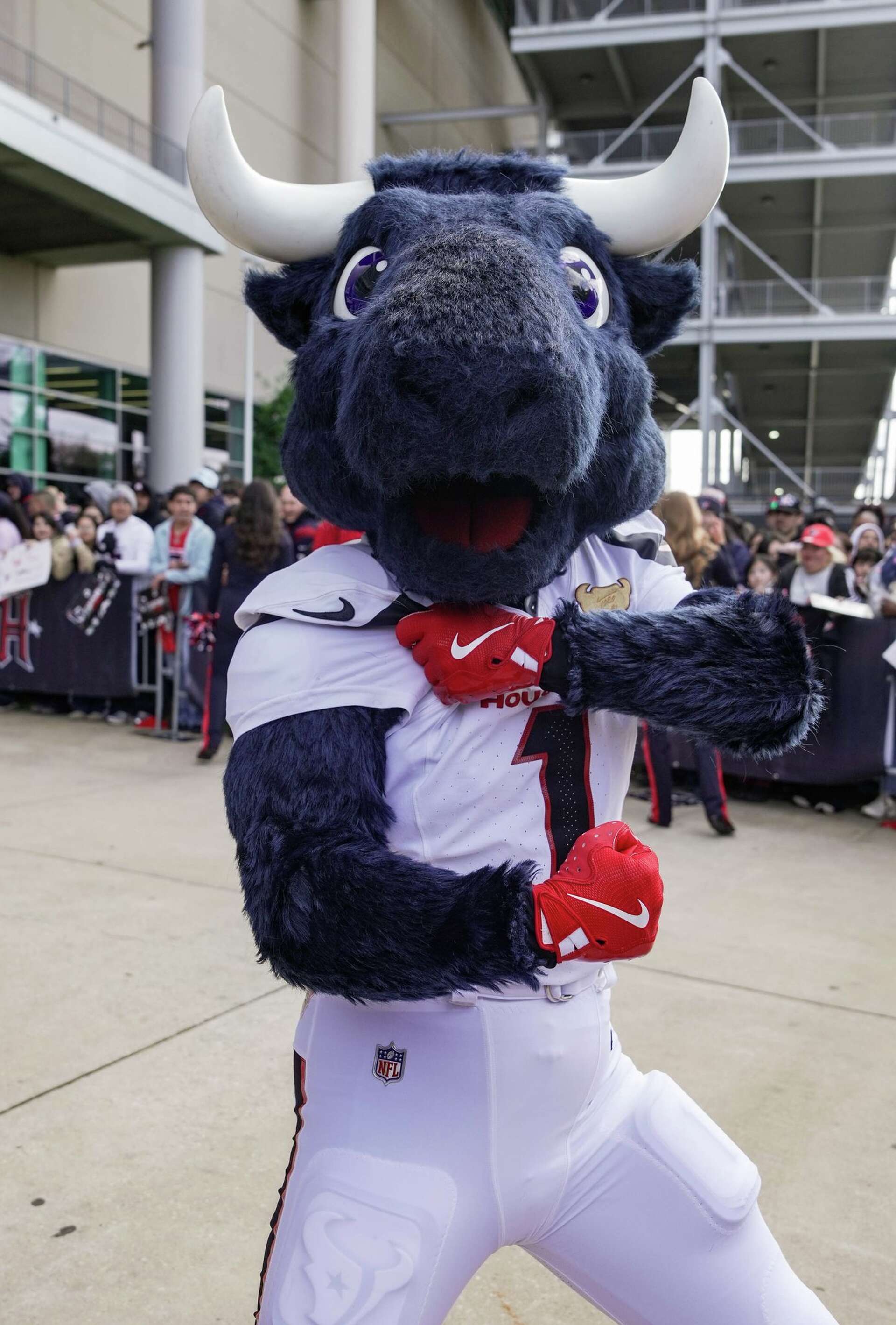 Hundreds of fans gather to cheer the Texans on as they go on the road